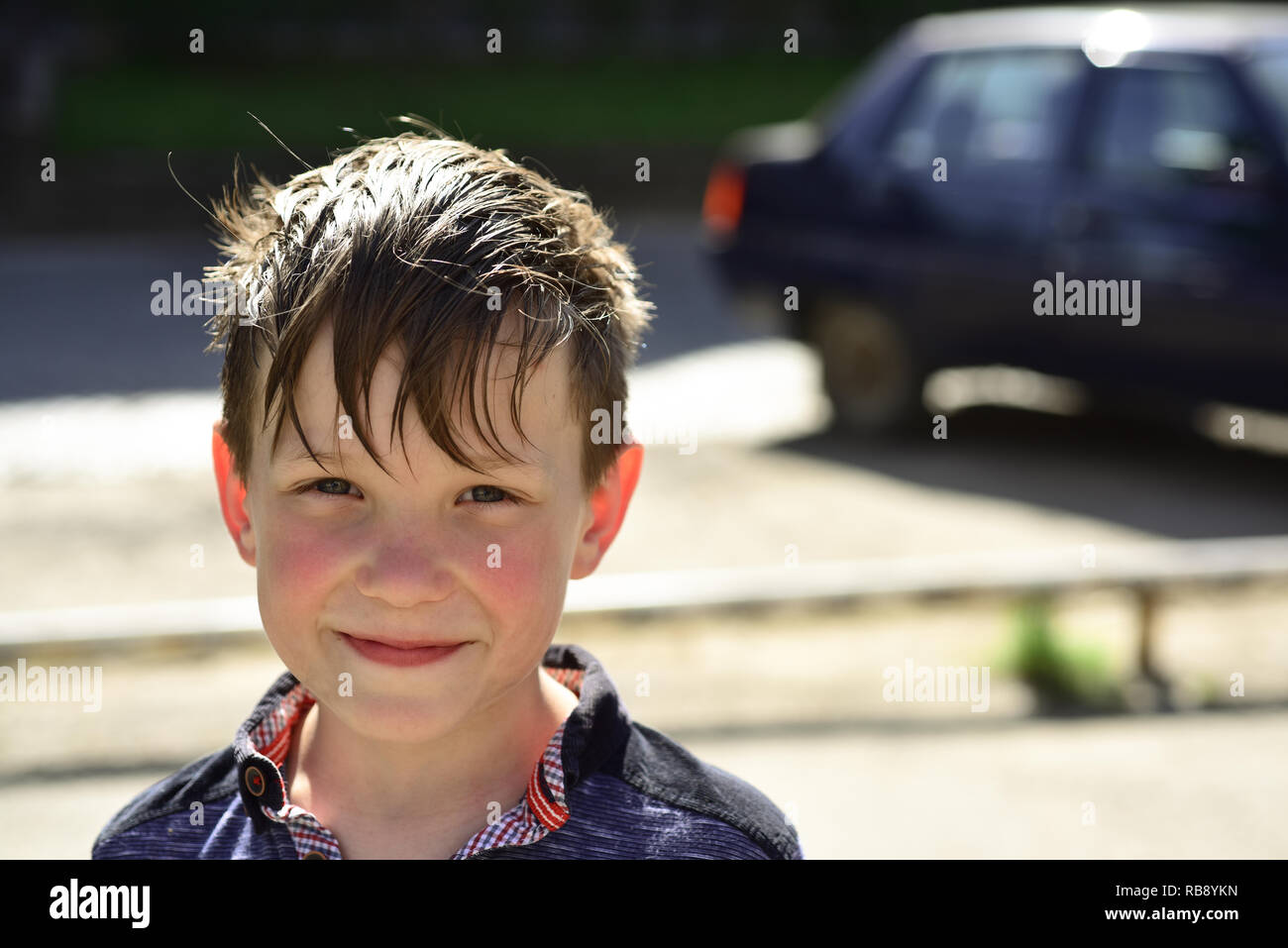 Taking care to protect kids skin. Little boy child on sunny day. Small ...