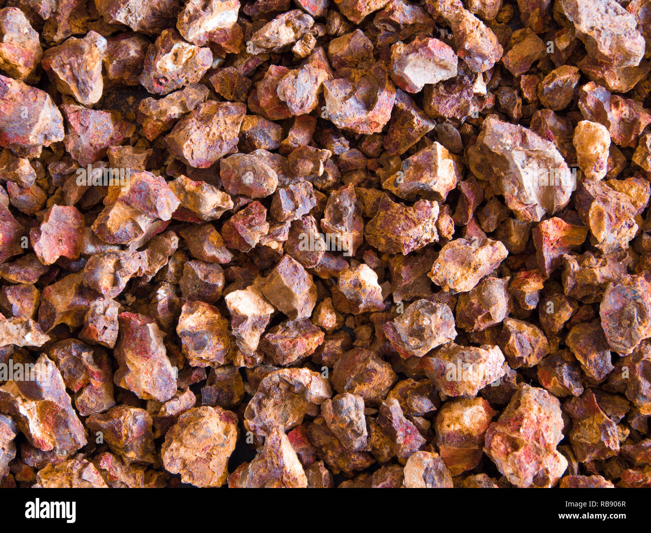 Red color of Iron oxide on gravel surface of broken laterite stone ...
