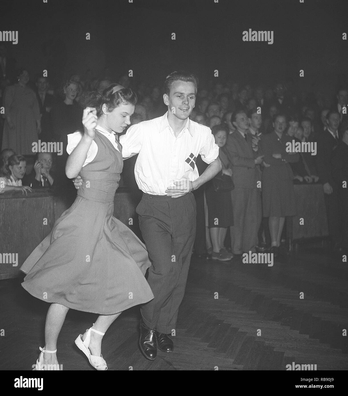 Jitterbug dance. A dance popularized in the United states and spread by ...