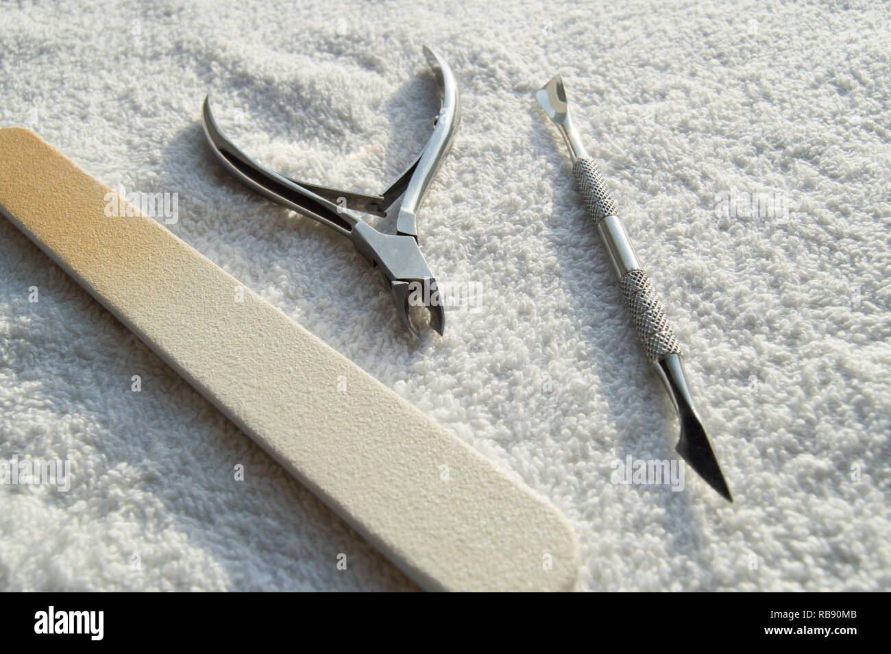 Tools of a manicure set on white background, concept of care of nails ...