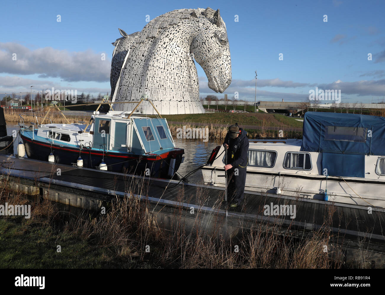 Winter sunshine at the Kelpies on the Forth and Clyde canal at Falkirk ...