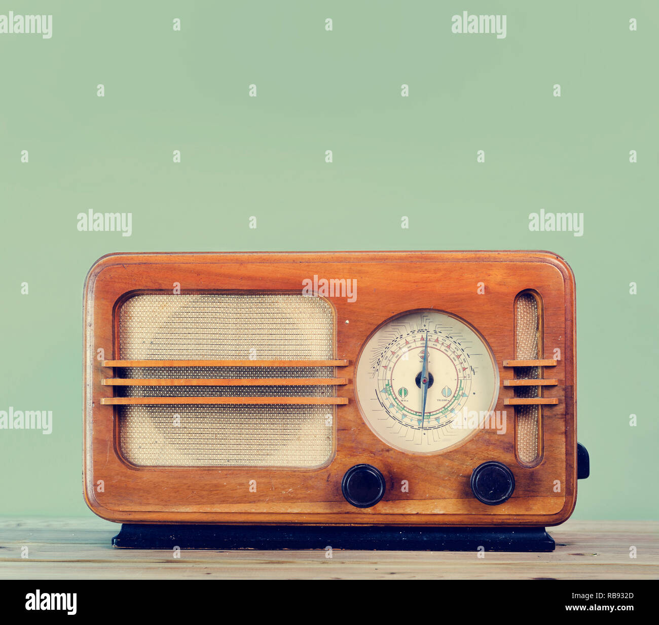 Old style vintage radio over retro mint background with copyspace ...