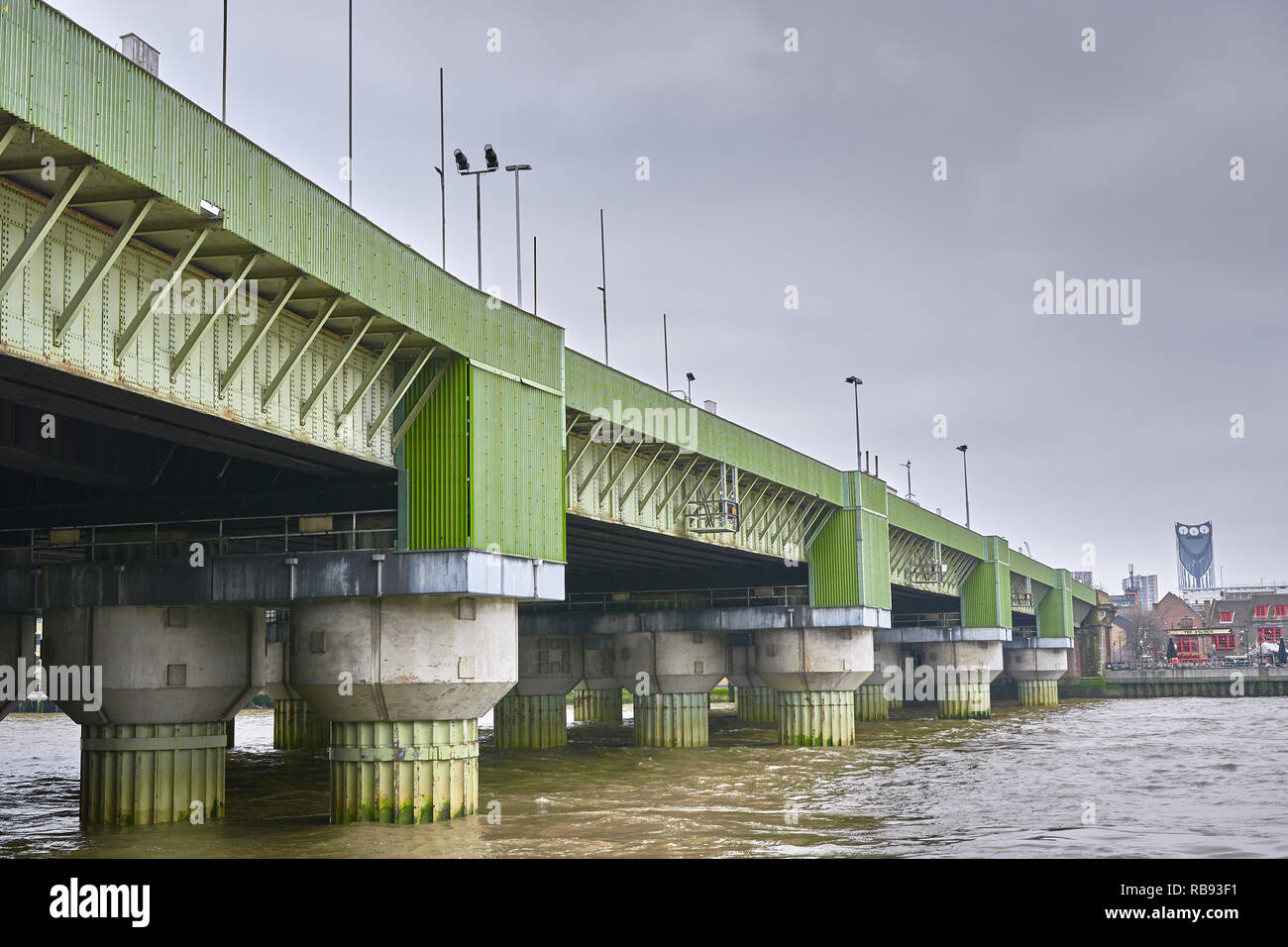 The green painted Cannon Street bridge, a railway crossing over the ...