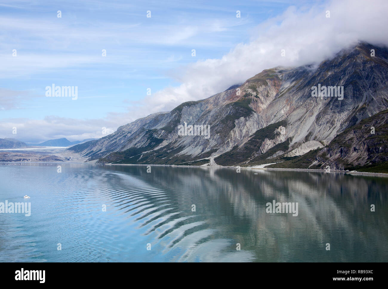 Reflections of mountainous coastline in Glacier Bay national park ...
