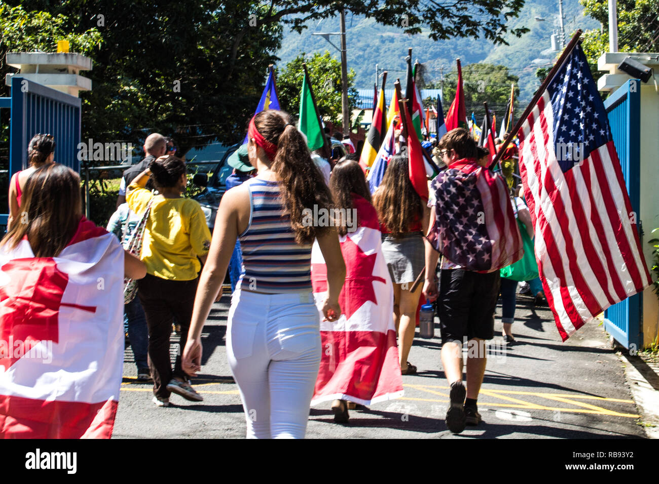 A photo of an international and multicultural crowd marching on a ...