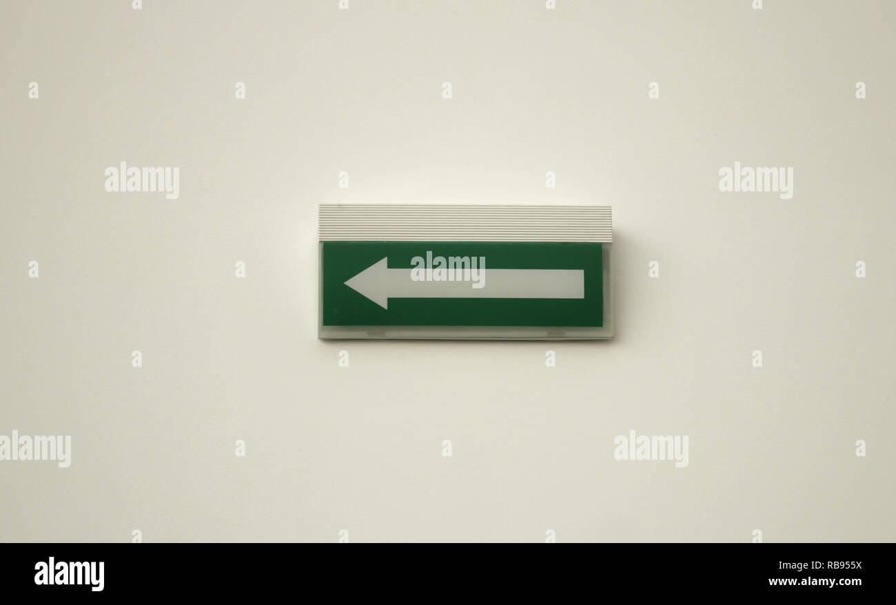 Exit arrow inside building, sign and symbol Stock Photo - Alamy