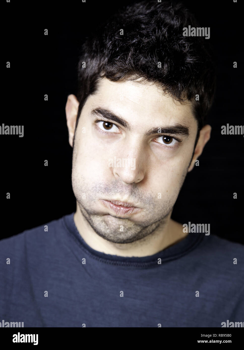 Man angry and tired, overwhelmed and sad, stress Stock Photo - Alamy