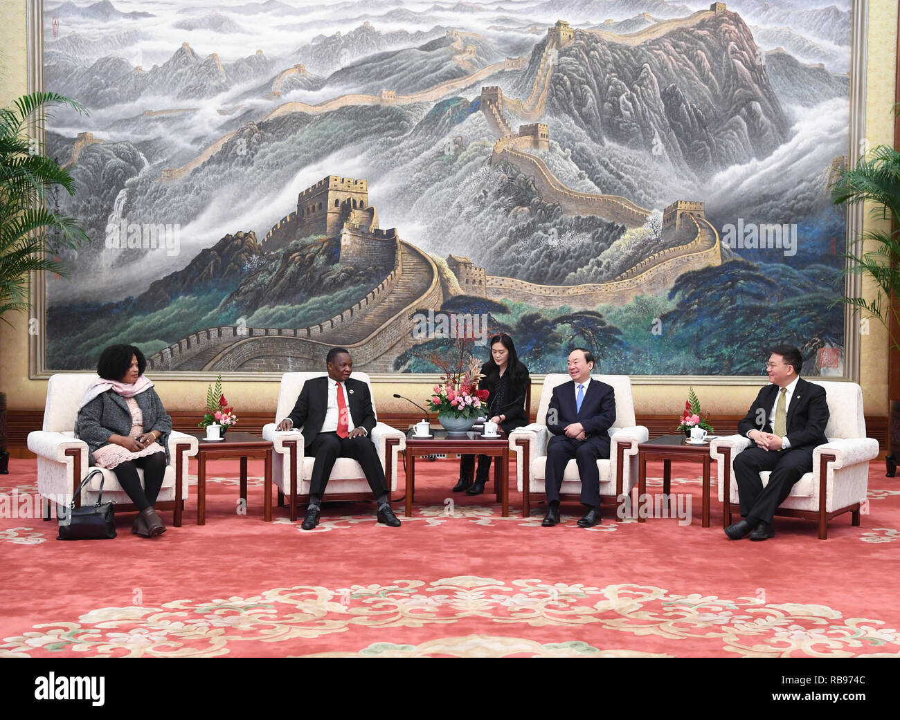 Beijing, China. 8th Jan, 2019. Huang Kunming (2nd R), a member of the ...