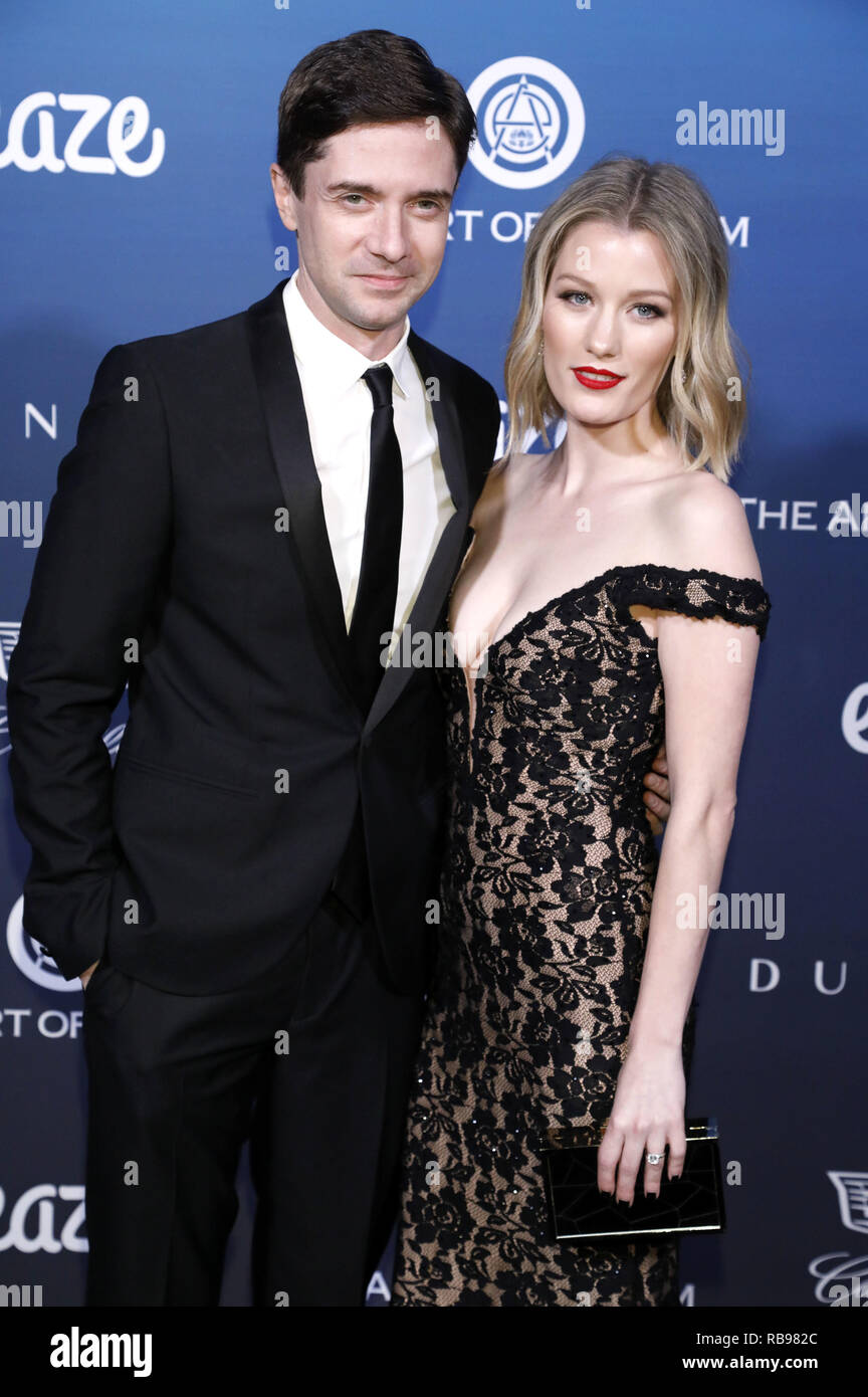 Topher Grace and his wife Ashley Hinshaw attending The Art of Elysium's ...