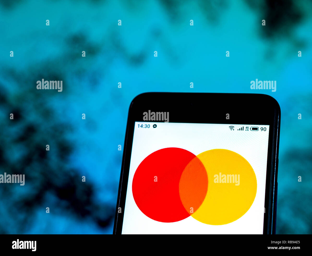 Mastercard new logo seen displayed on smart phone. The company ...