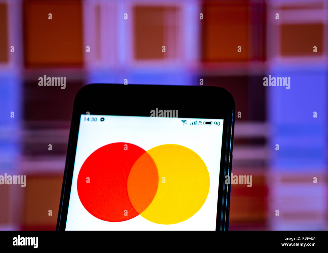 Mastercard new logo seen displayed on smart phone. The company ...