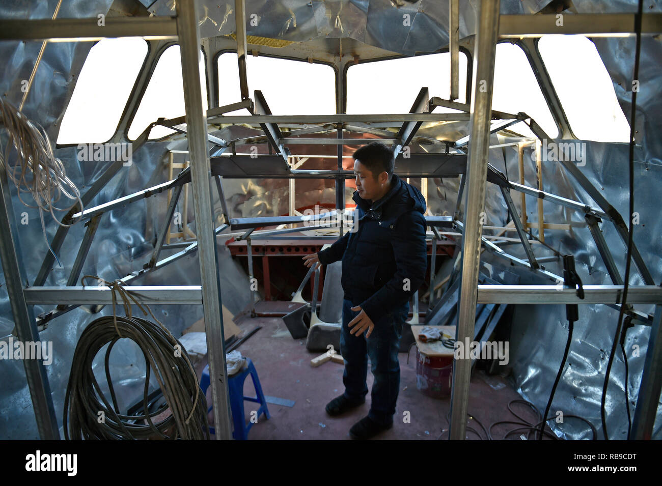 Tieling, China's Liaoning Province. 8th Jan, 2019. Zhu Yue explains the ...