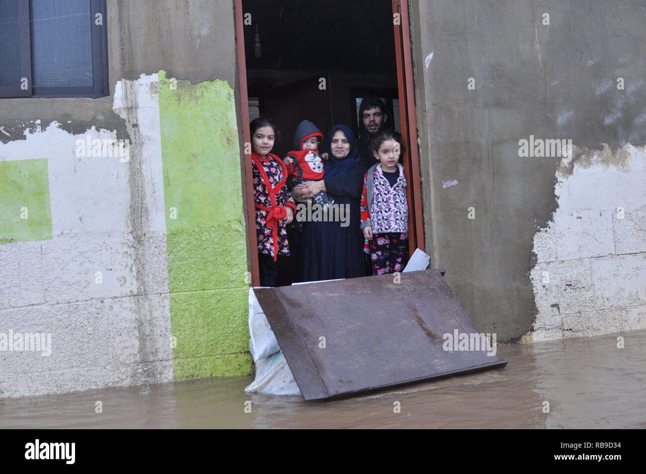 Beirut, Lebanon. 8th Jan, 2019. A refugee family is seen in a house ...
