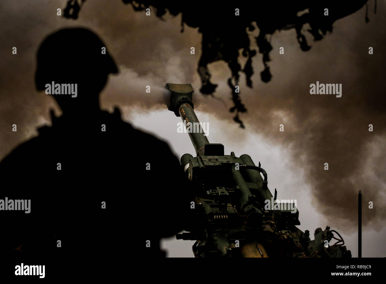 3rd Cavalry Regiment Field Artillery Squadron Troopers fire an M777A2 ...