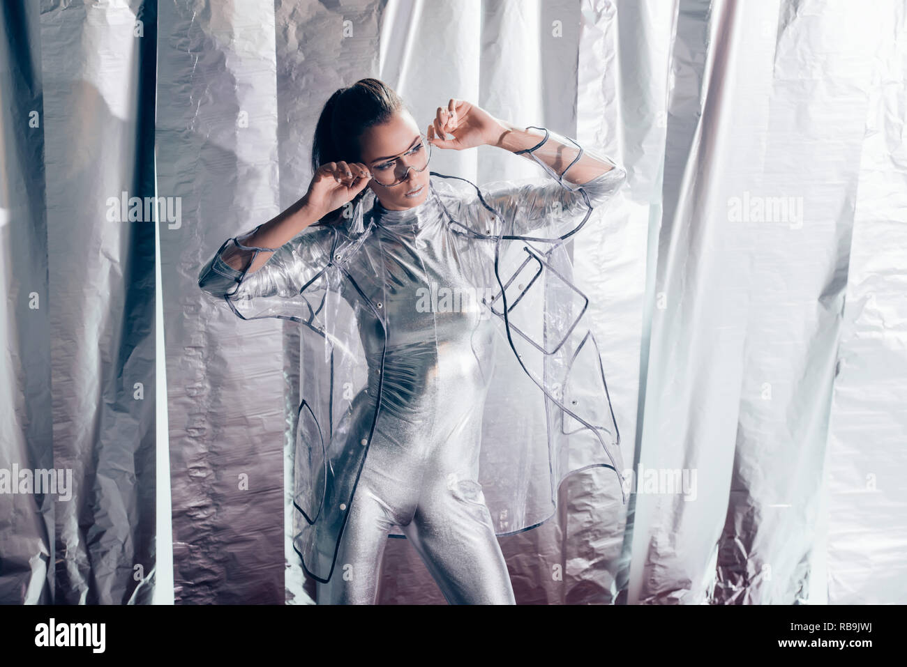 Silver raincoat hi-res stock photography and images - Alamy