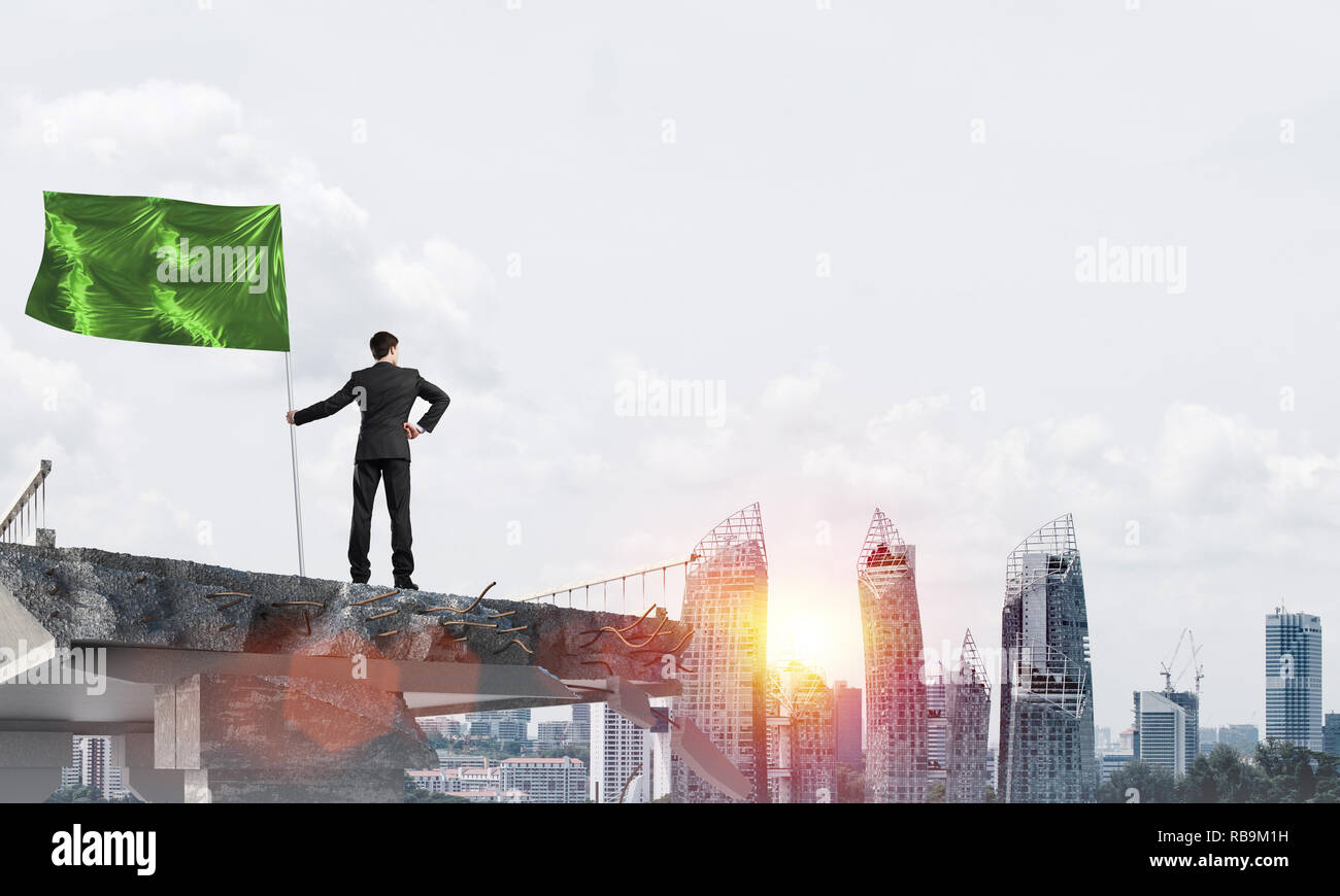 Man with flag presenting leadership concept Stock Photo - Alamy