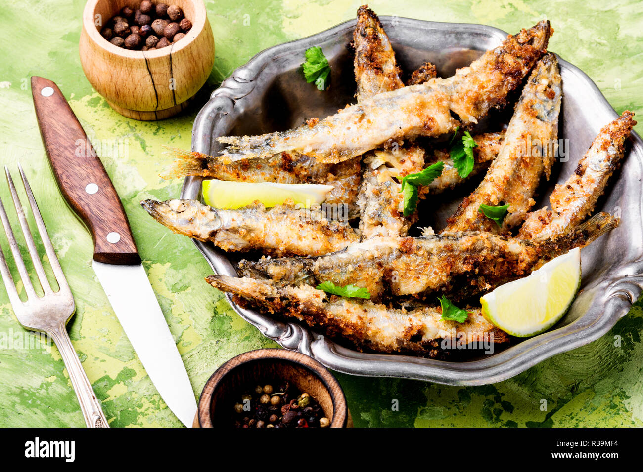 Fried small fish crispy deep hi-res stock photography and images - Alamy