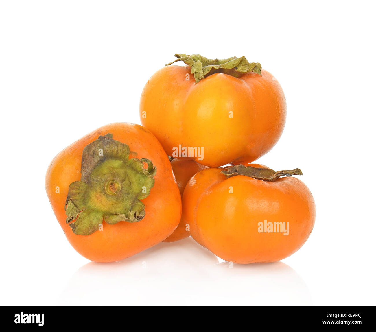 fresh ripe persimmons isolated on white background Stock Photo - Alamy