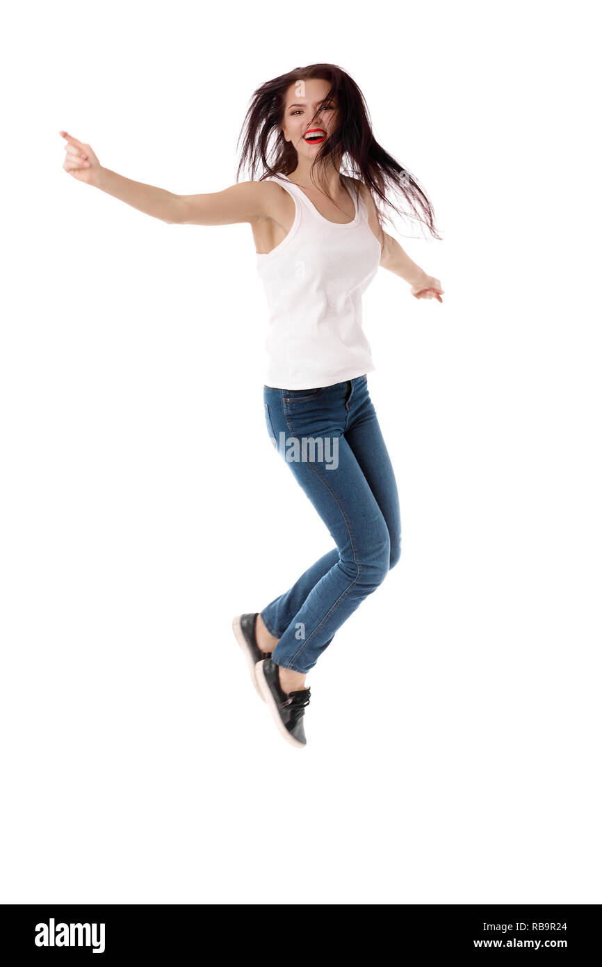 young woman is jumping on a white background Stock Photo - Alamy