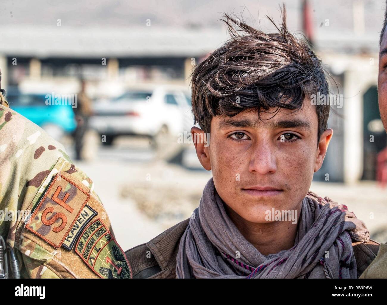 Afghan boy patrolling hi-res stock photography and images - Alamy