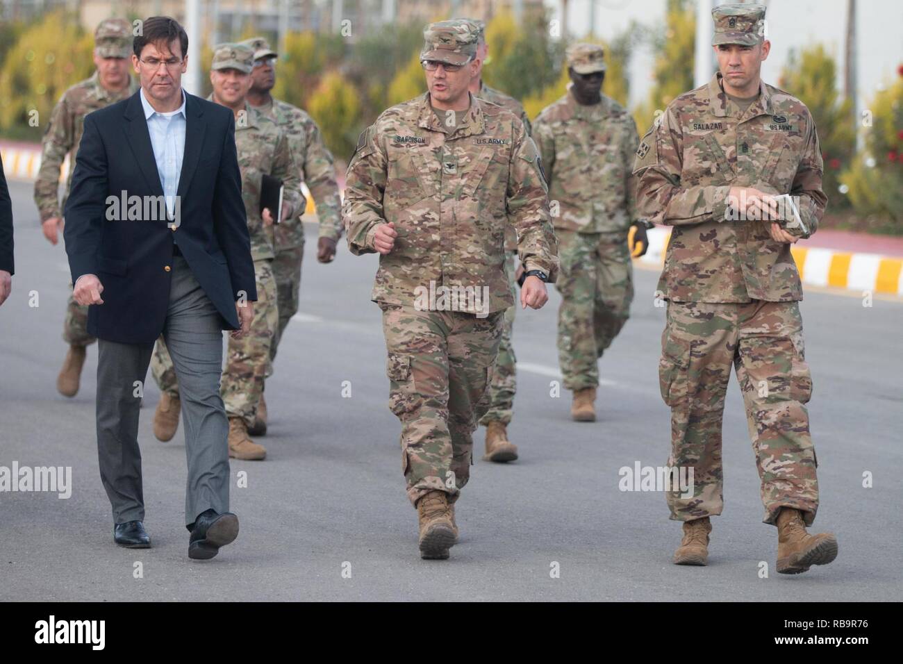 Dr. Mark T. Esper, 23rd Secretary of the Army, walks with Col ...