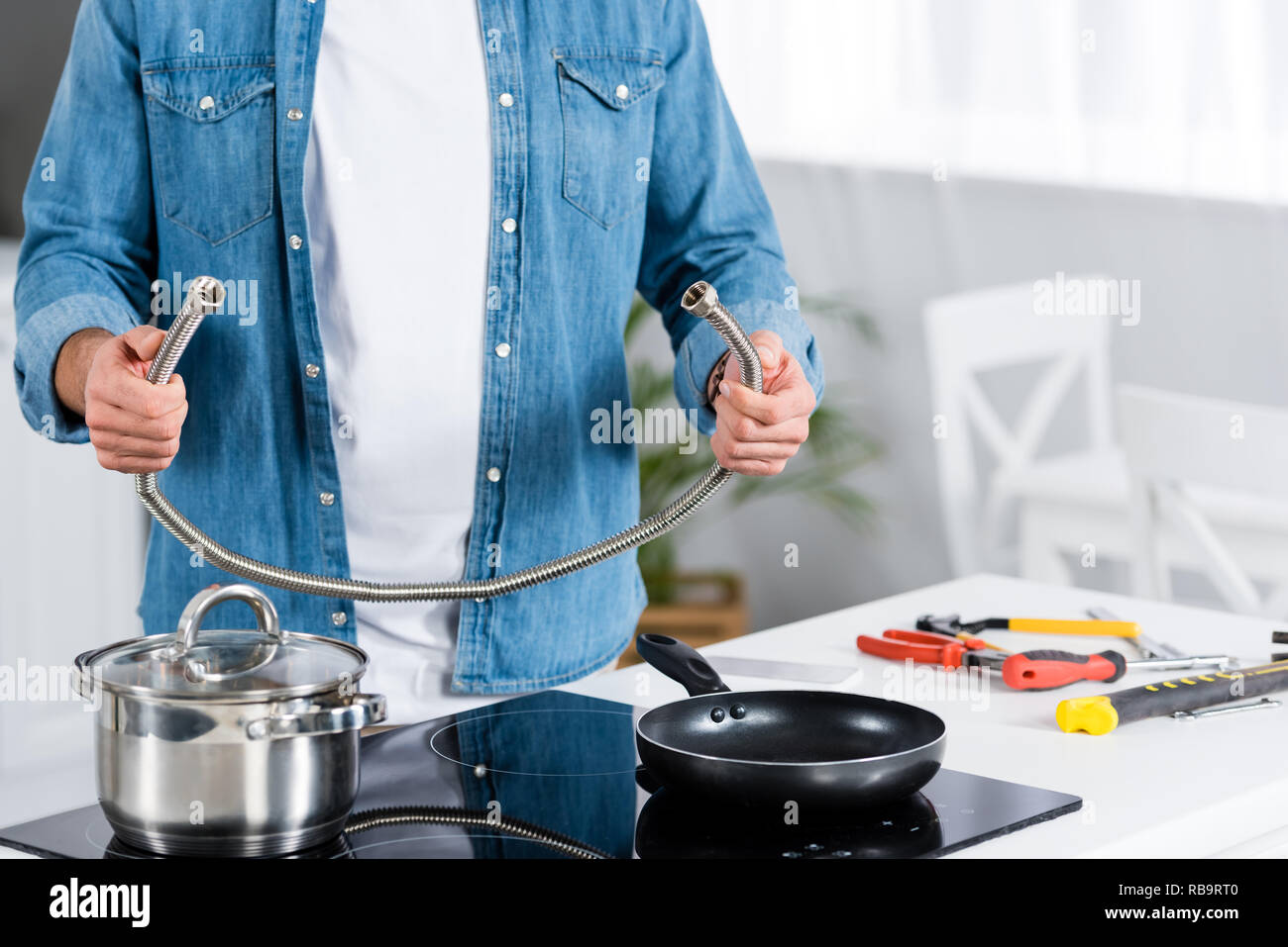 Hose kitchen hi-res stock photography and images - Alamy