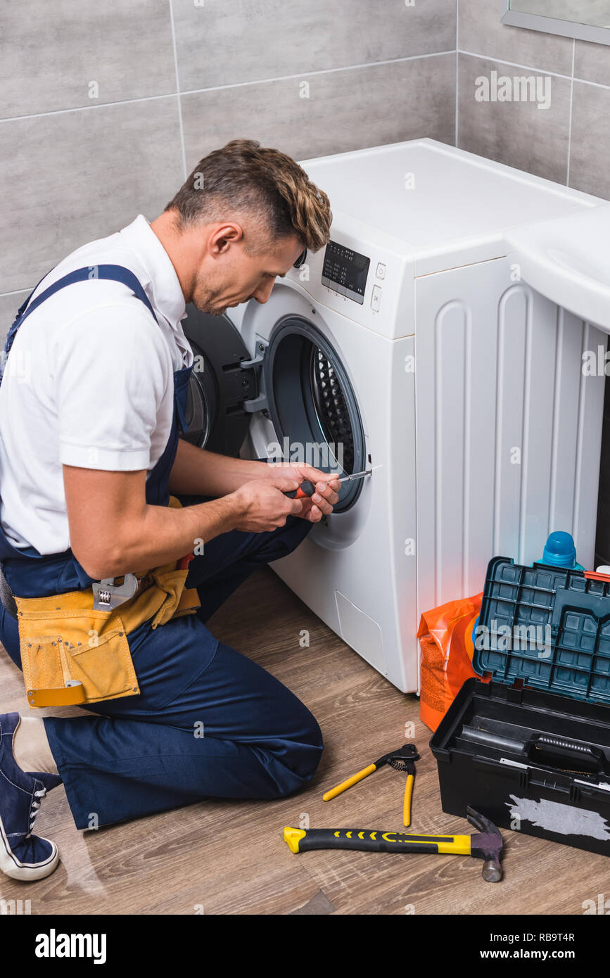 Repairing washing machine hi-res stock photography and images - Alamy