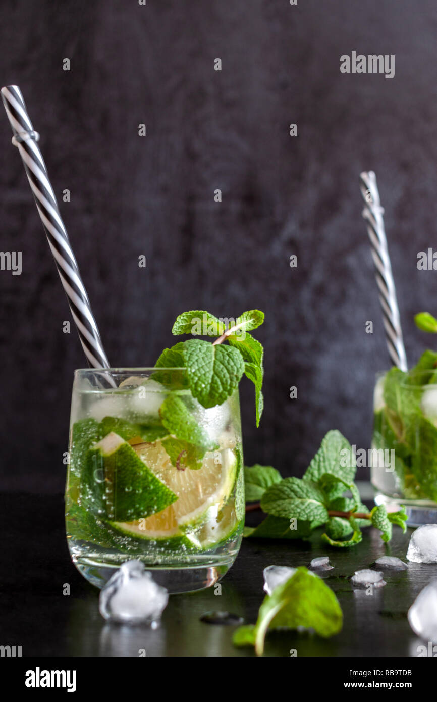 Mojito Cubano or caipirinha cocktail, iced drink with lime and mint ...