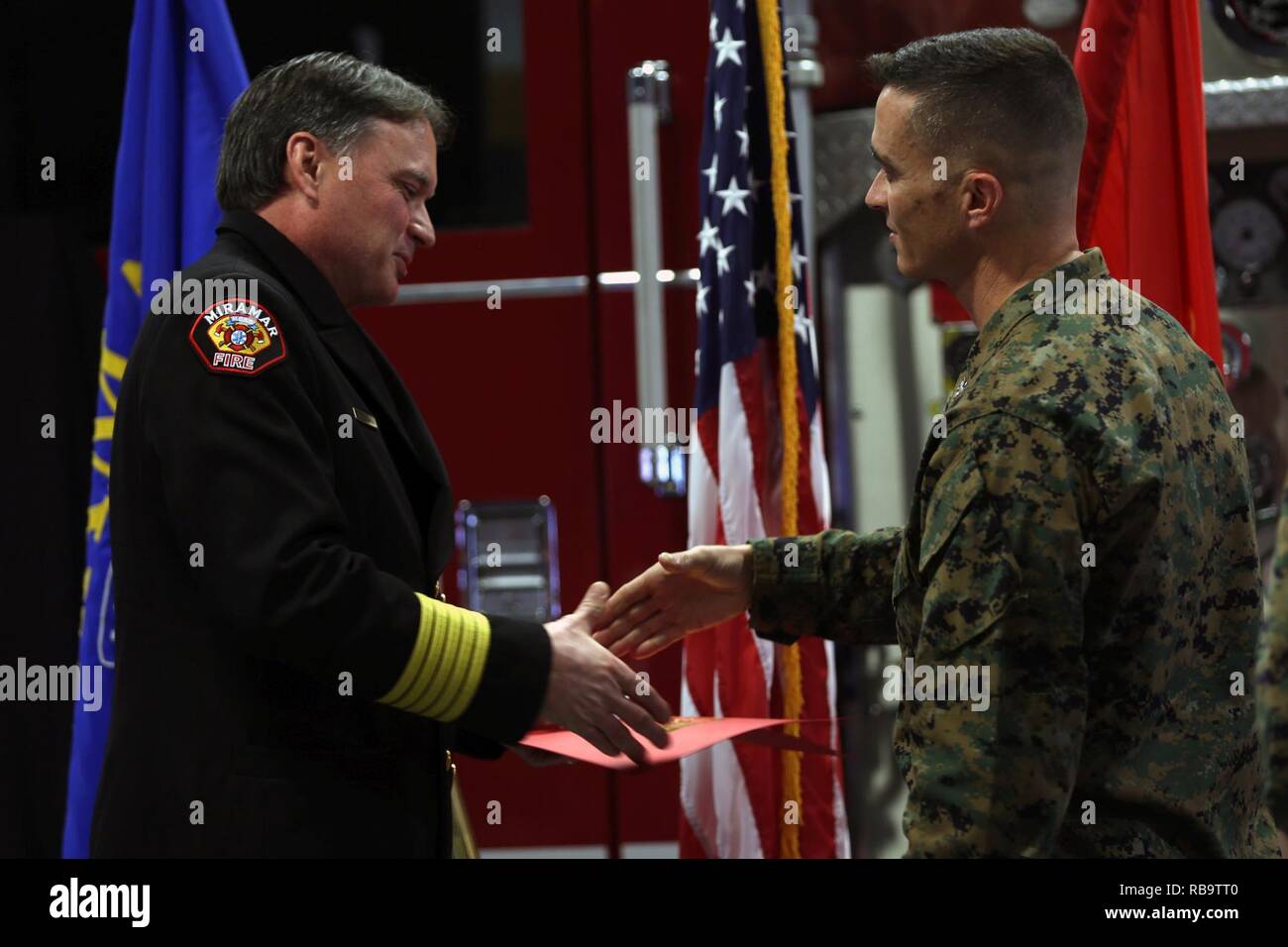 Col. Charles Dockery, commanding officer of MCAS Miramar, right, thanks ...