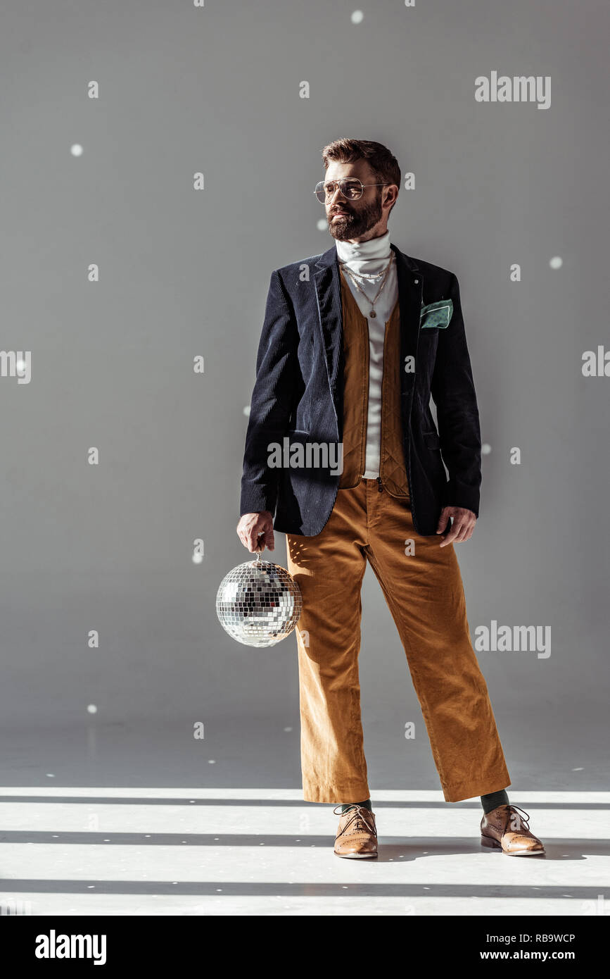 Man posing disco ball on hi-res stock photography and images - Alamy