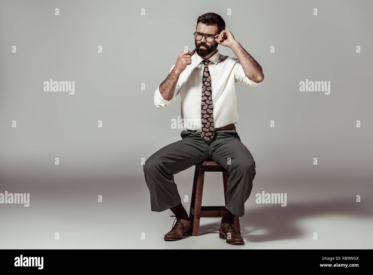Man Sitting In Chair Smoking High Resolution Stock Photography and ...