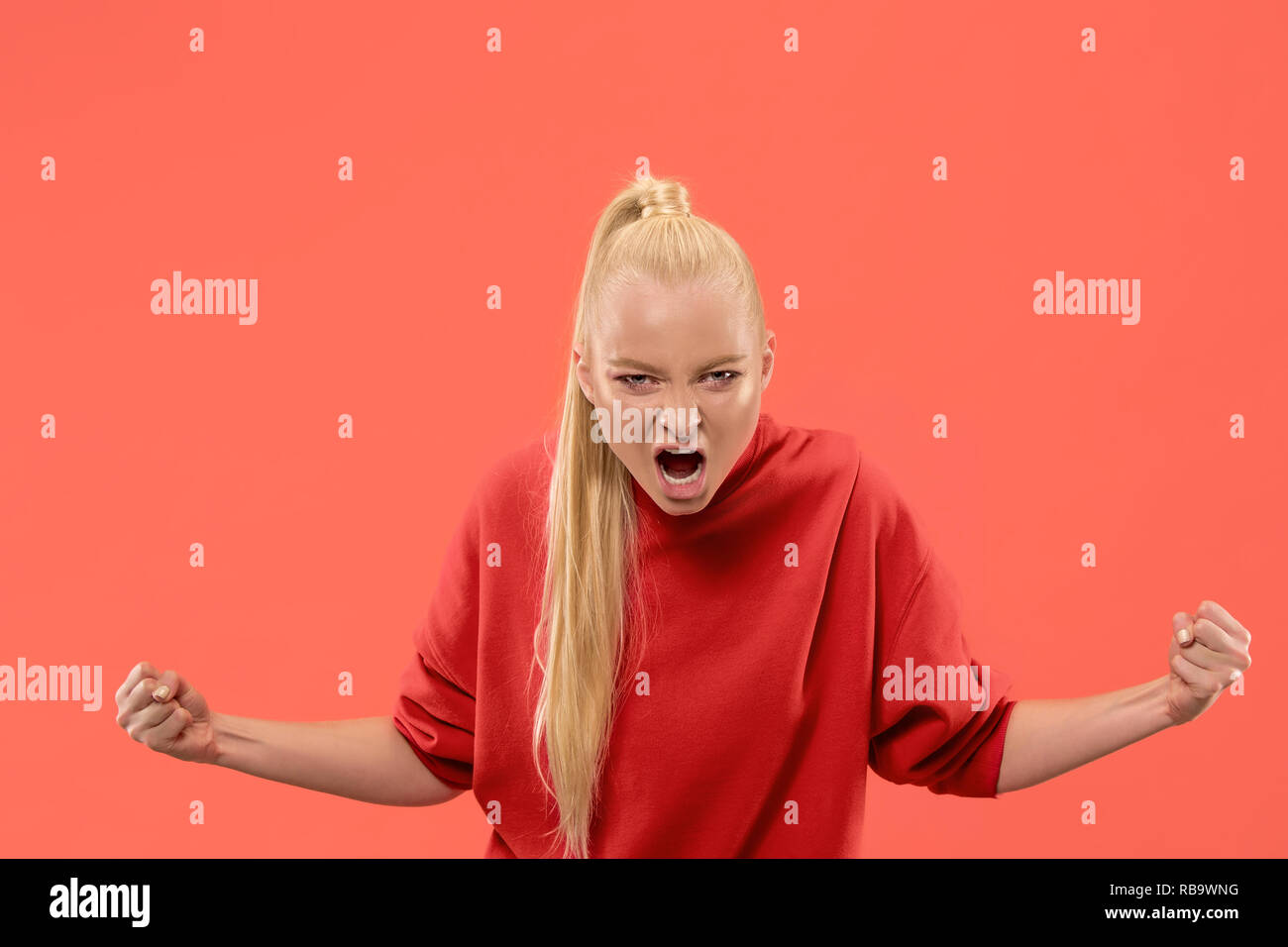 Screaming, hate, rage. Crying emotional angry woman screaming on coral ...