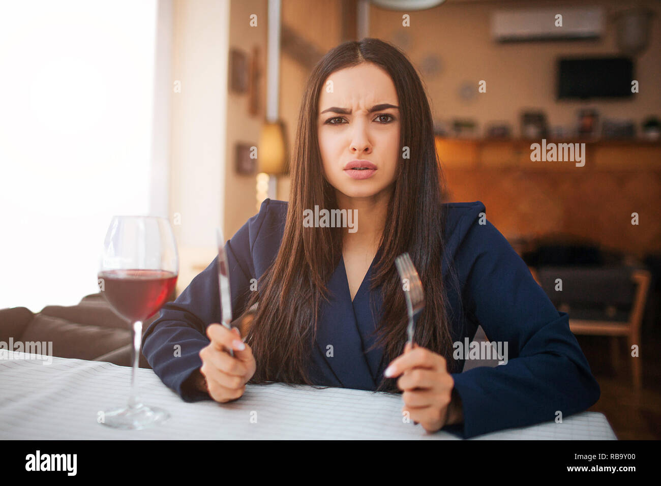 Angry woman restaurant on table hi-res stock photography and images - Alamy