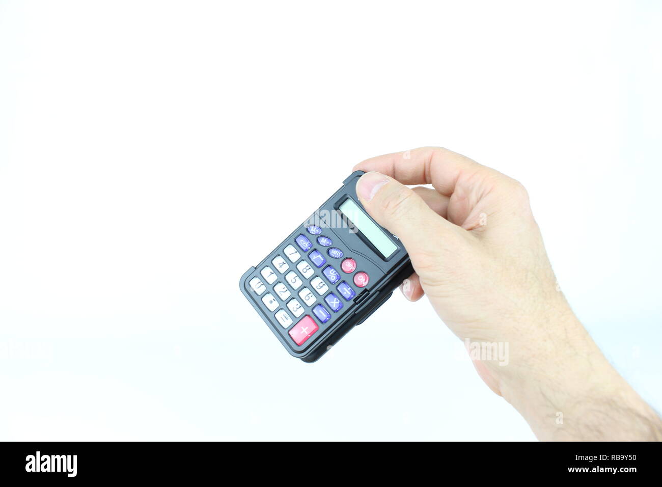 Man holding a calculator hi-res stock photography and images - Alamy