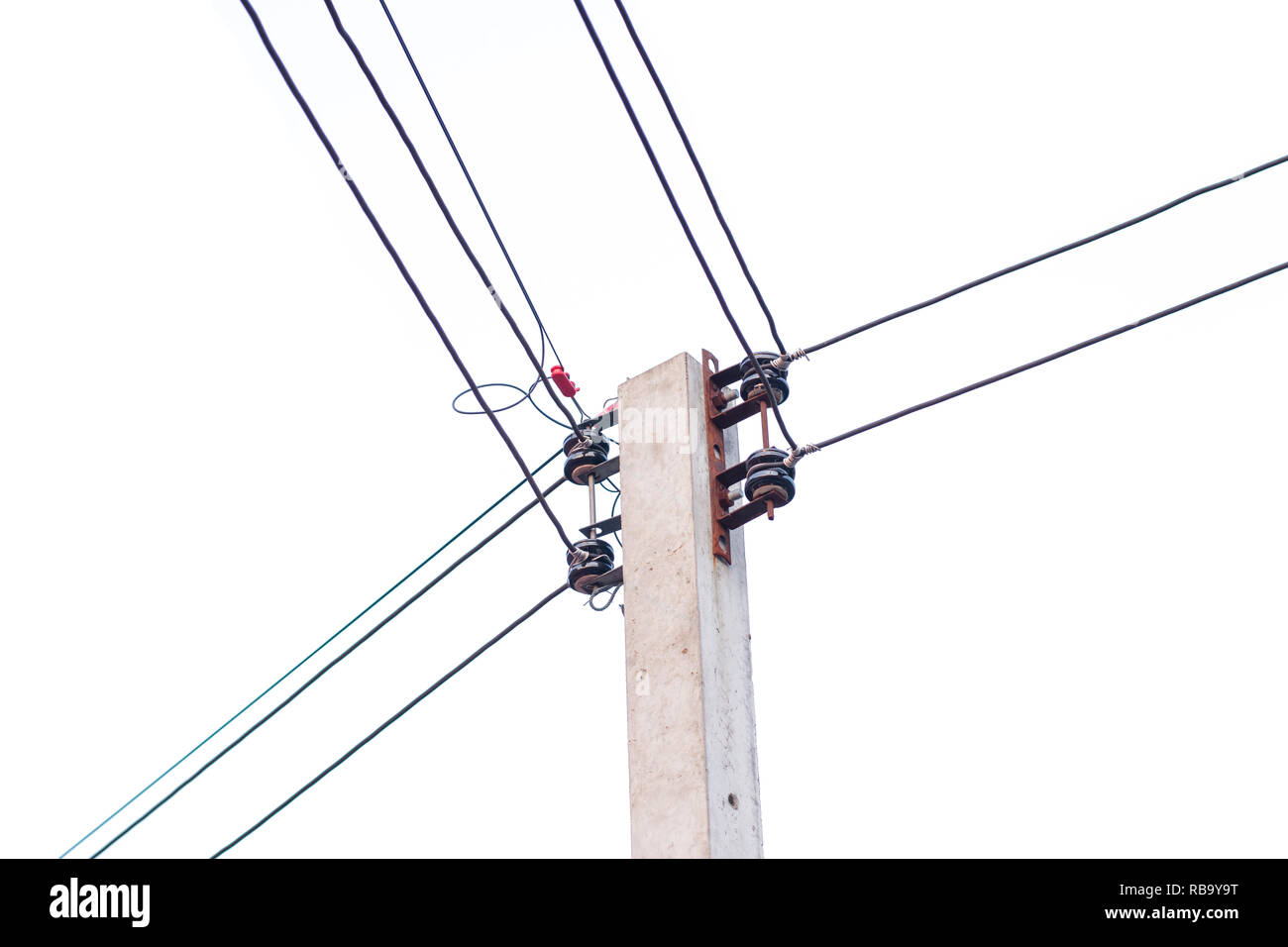 Electric pole isolated on white background Stock Photo - Alamy