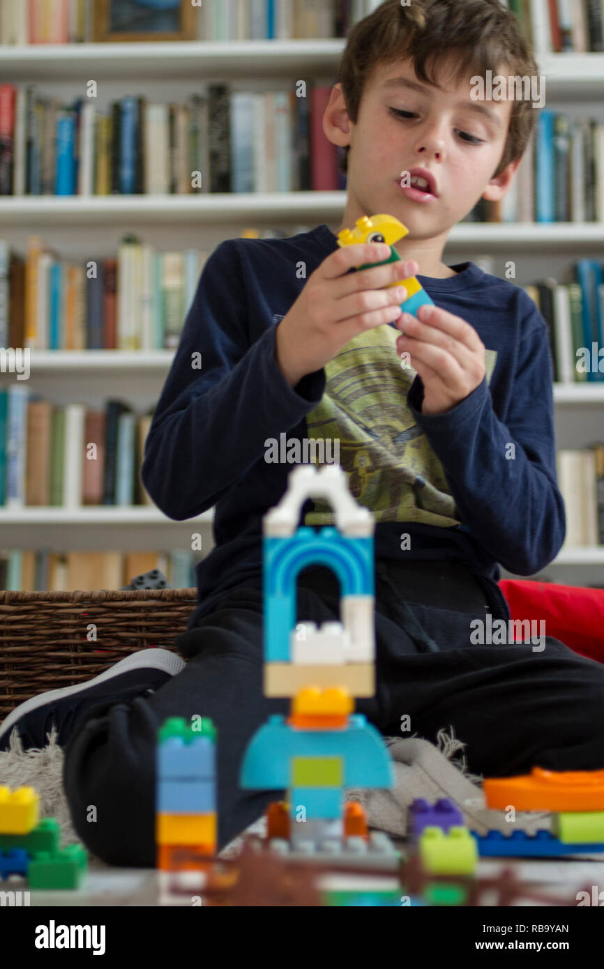 Boy build blocks hi-res stock photography and images - Alamy