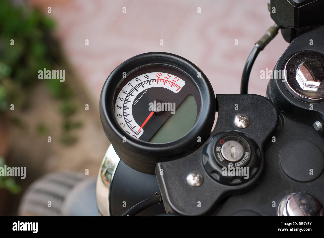 Speedometer on motorcycle dashboard. Round speedometer with red arrow ...