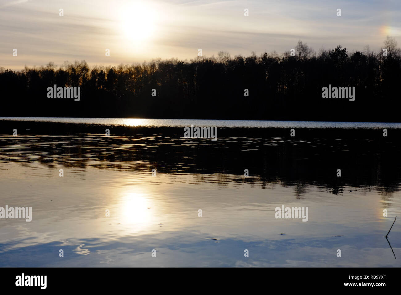 Beautiful lake and forest during sunset Stock Photo - Alamy