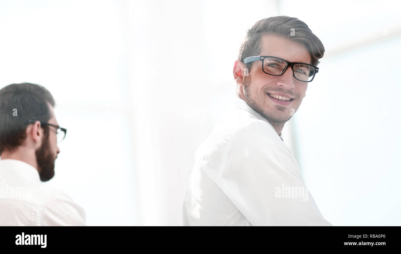 rear view.employees in the workplace Stock Photo - Alamy