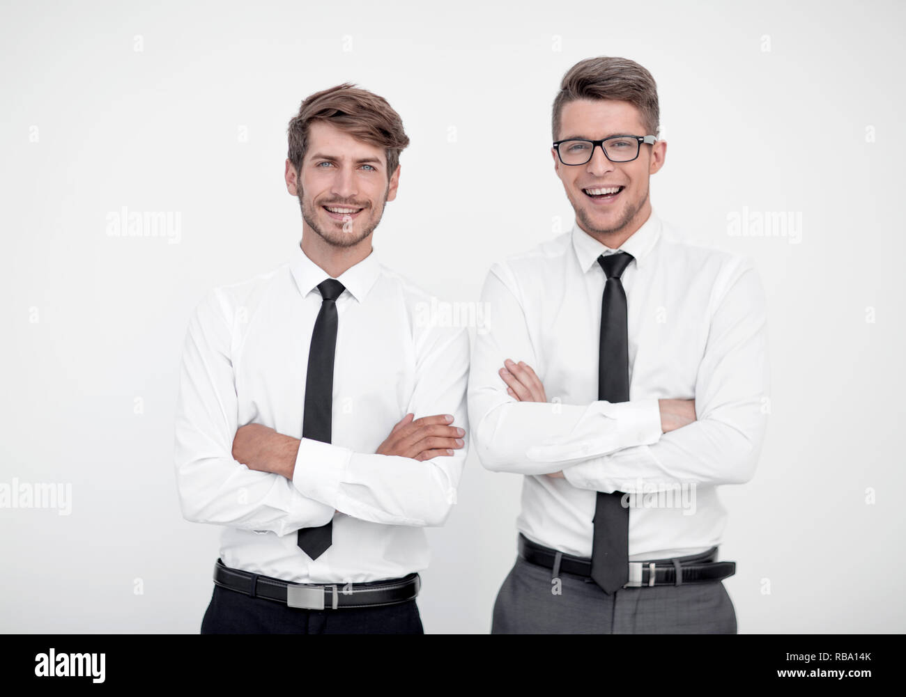two men are standing in the office Stock Photo - Alamy
