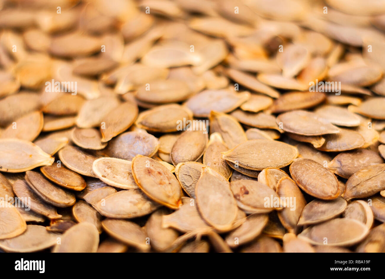 Pumpkin seeds without Husk close up – copy space for text Stock Photo ...