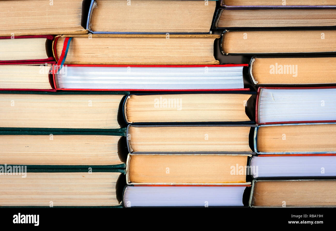 Stack of books education concept background, many books piles Stock ...