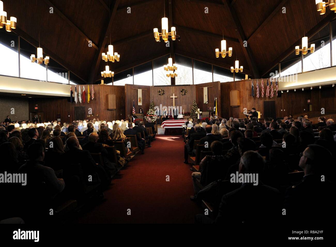The family of U.S. Maj. Troy Gilbert speaks during his memorial service ...