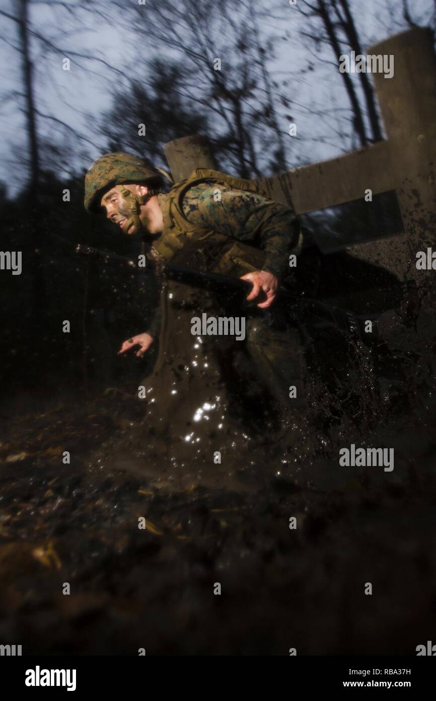 U.S. Marine Pfc. Tyler Pender, a combat photographer with the Combat ...