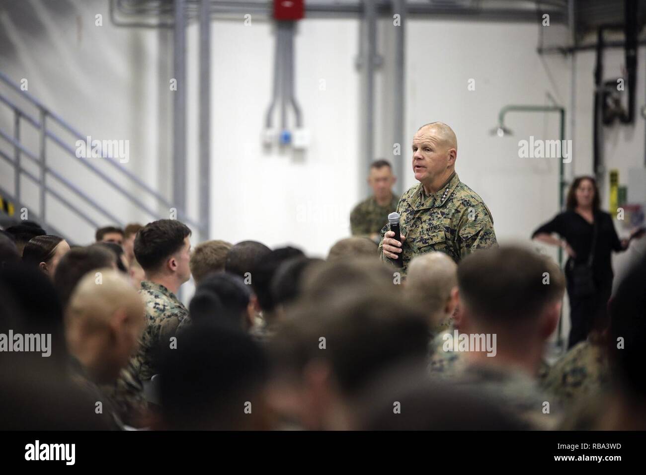 General Robert Neller, the commandant of the Marine Corps, speaks to ...