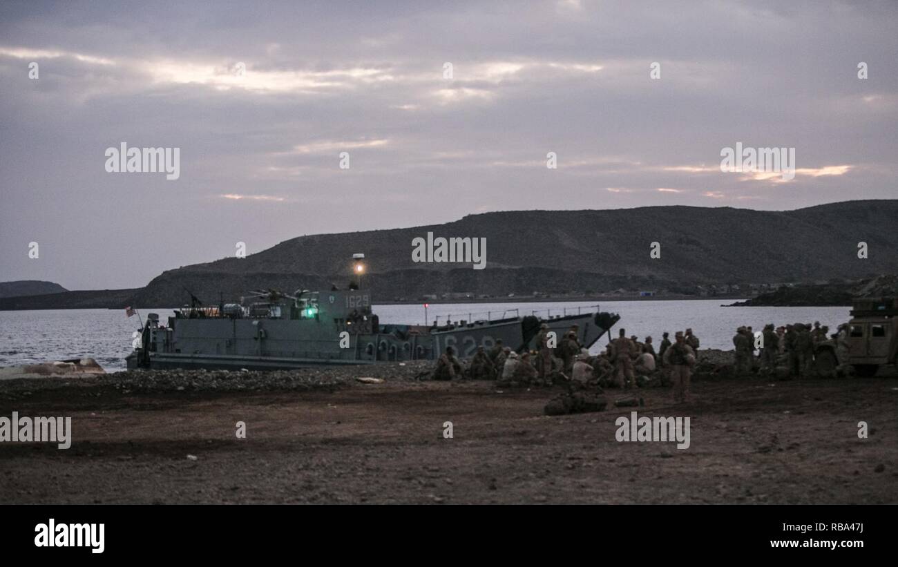 ARTA BEACH, Djibouti (Dec. 20, 2016) Marines and Sailors with 11th ...