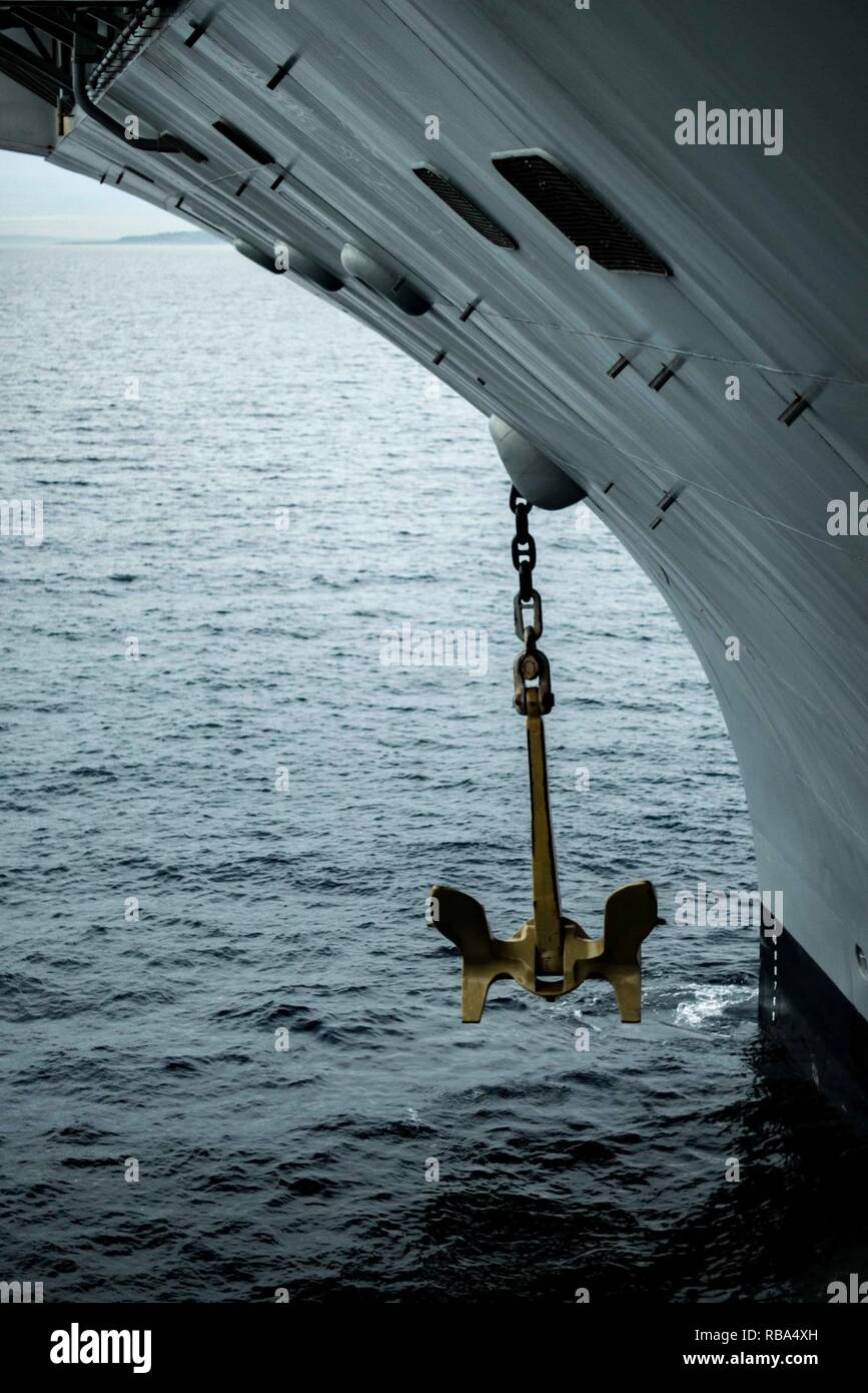 SAN DIEGO (Dec. 21 2016) The port side anchor is lowered into the water ...