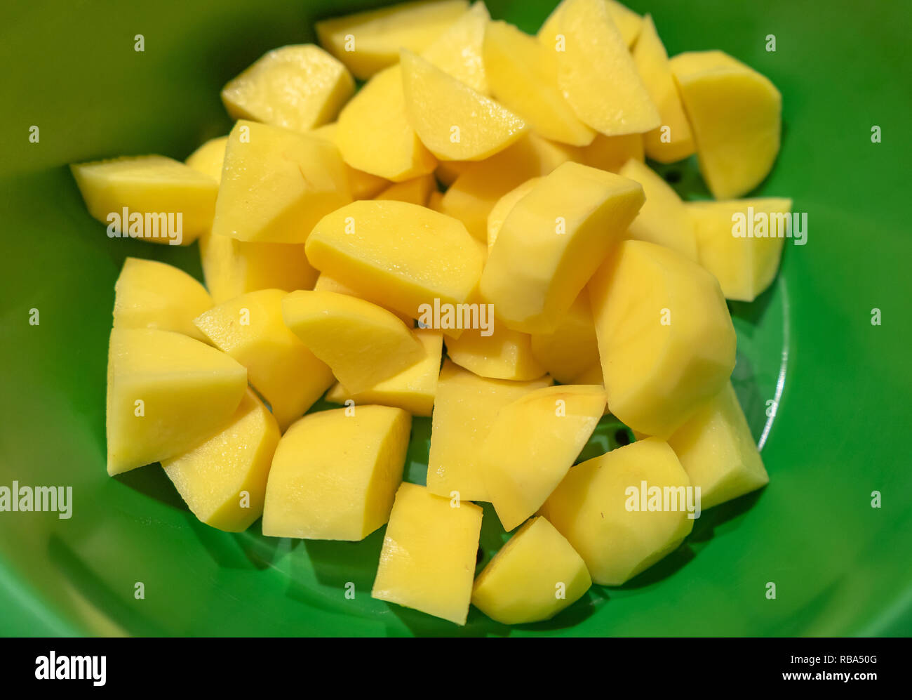 Potatoes in a sieve Stock Photo - Alamy