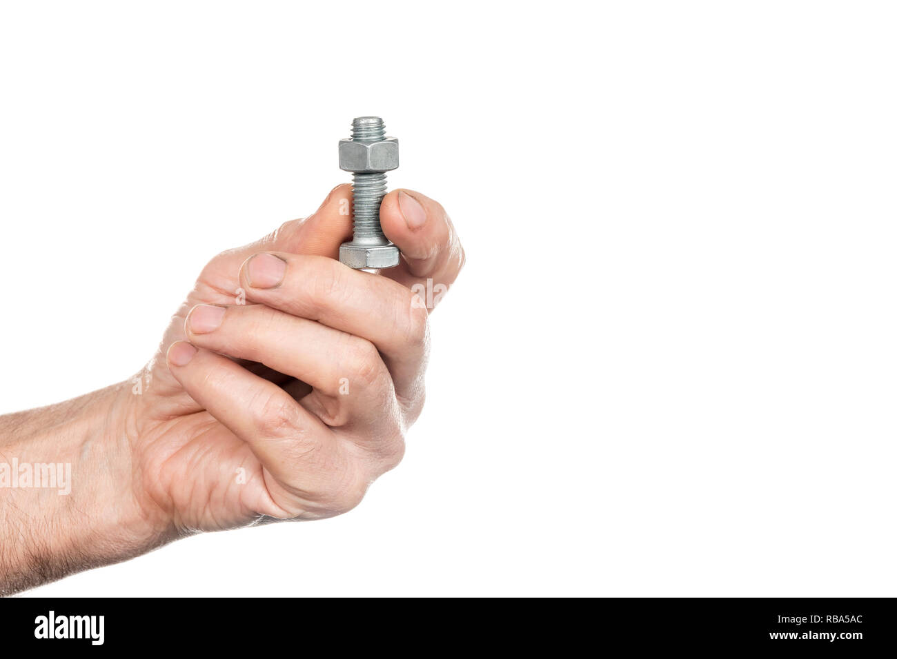 Bolt and nut in male workers hands isolated on white background Stock ...
