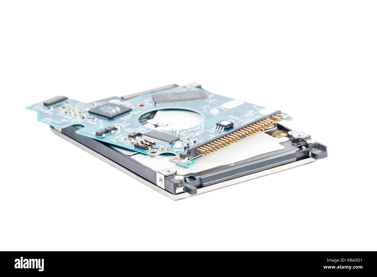 broken hard drive with chip board on top, isolated on white background ...